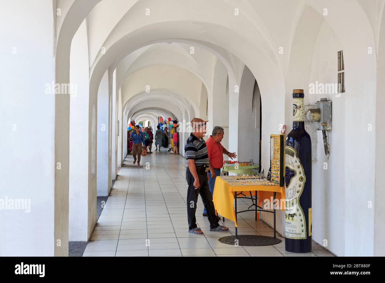 Arches & stores, Manzanillo City, Colima State, Mexico Stock Photo - Alamy