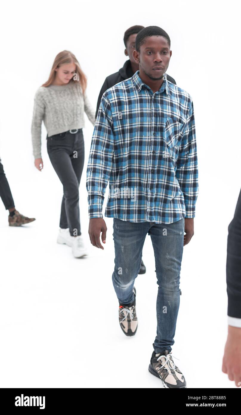 group of diverse young people striding forward Stock Photo - Alamy