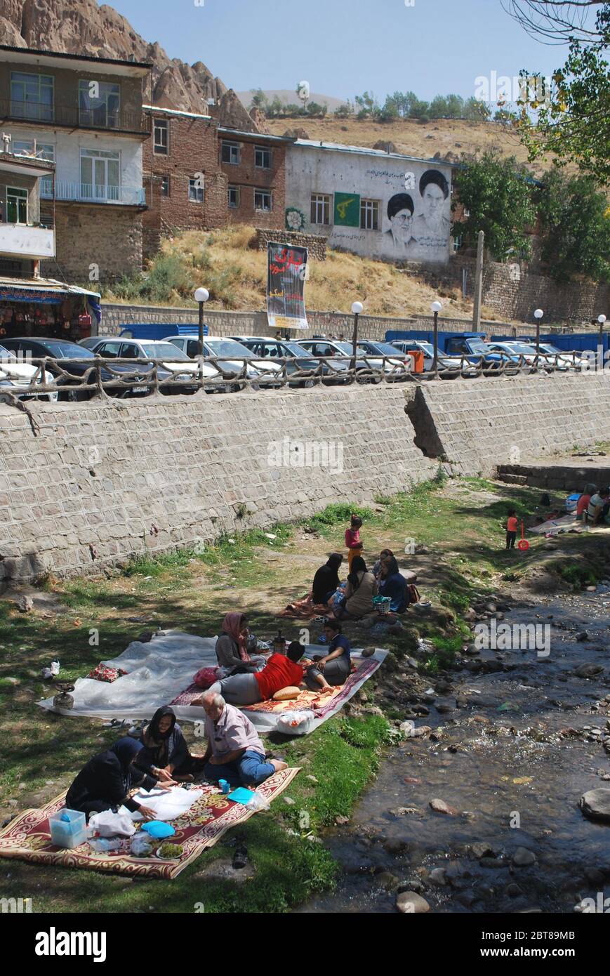 people having a picnic in Kandovan, troglodyte village, nr. Osku, Iran ...