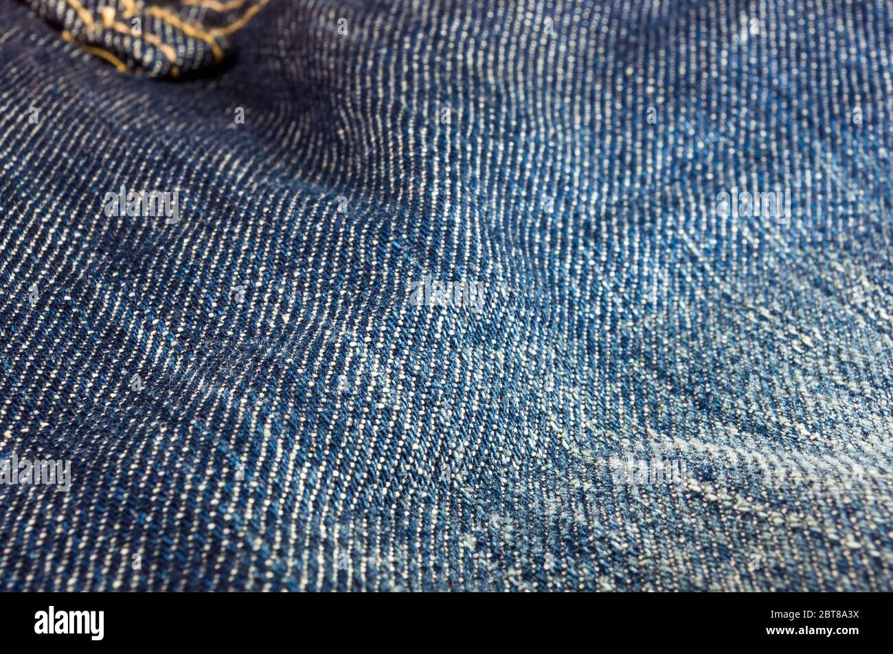 clothing items blue stonewashed faded jeans cotton fabric texture with ...