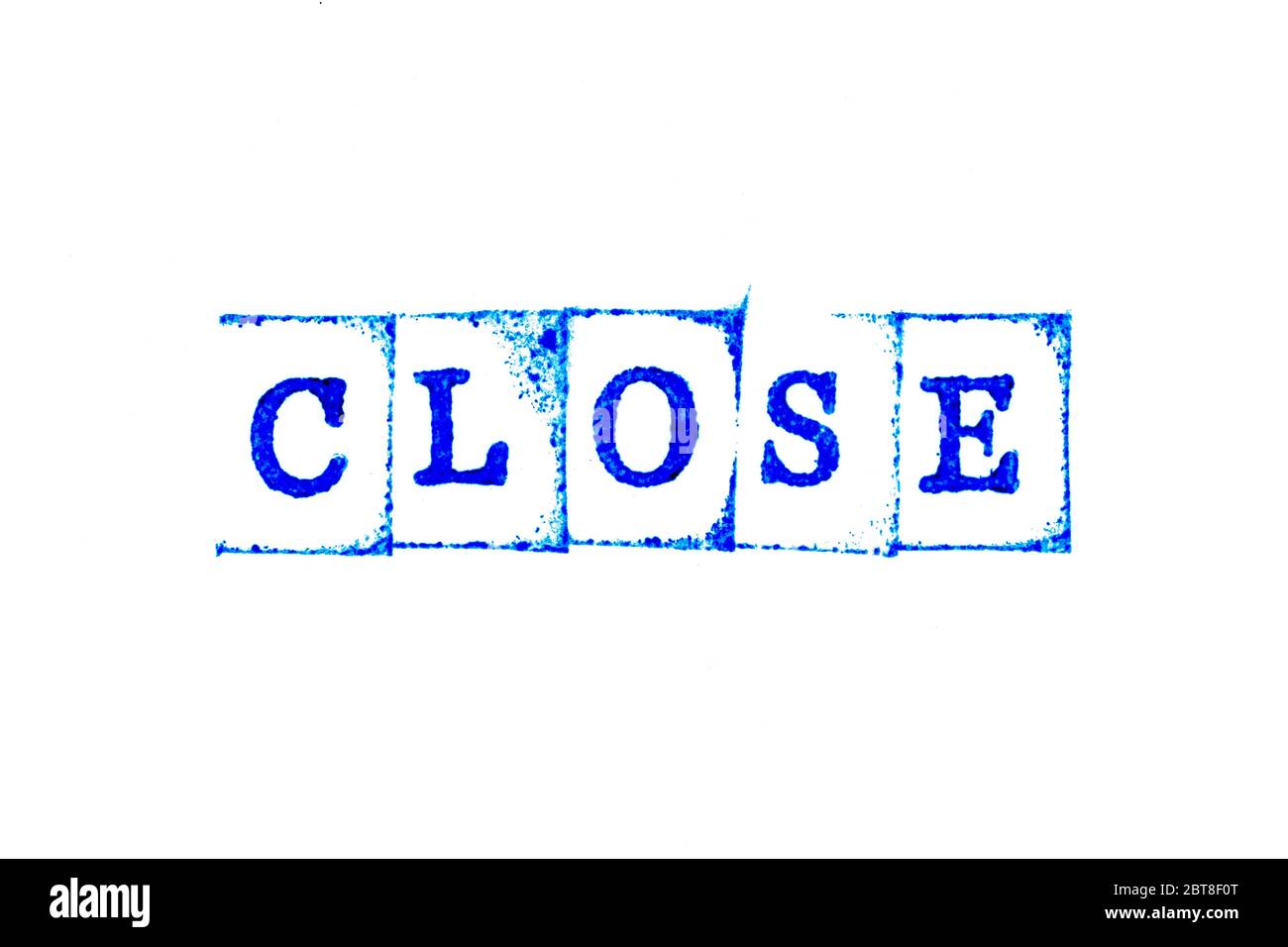 Blue ink of rubber stamp in word close on white paper background Stock ...