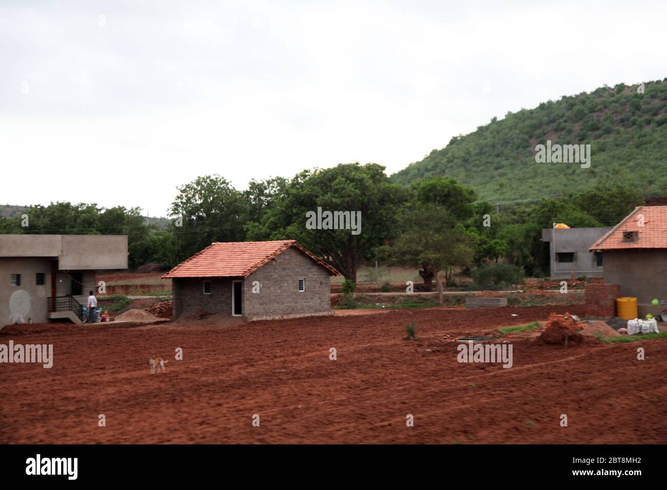 Beautiful landscape with a small village surrounded by greenery ...