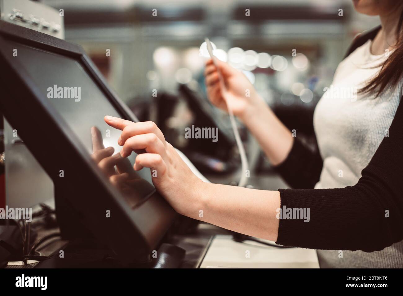 Cashier touchscreen touch screen cash register hi-res stock photography ...