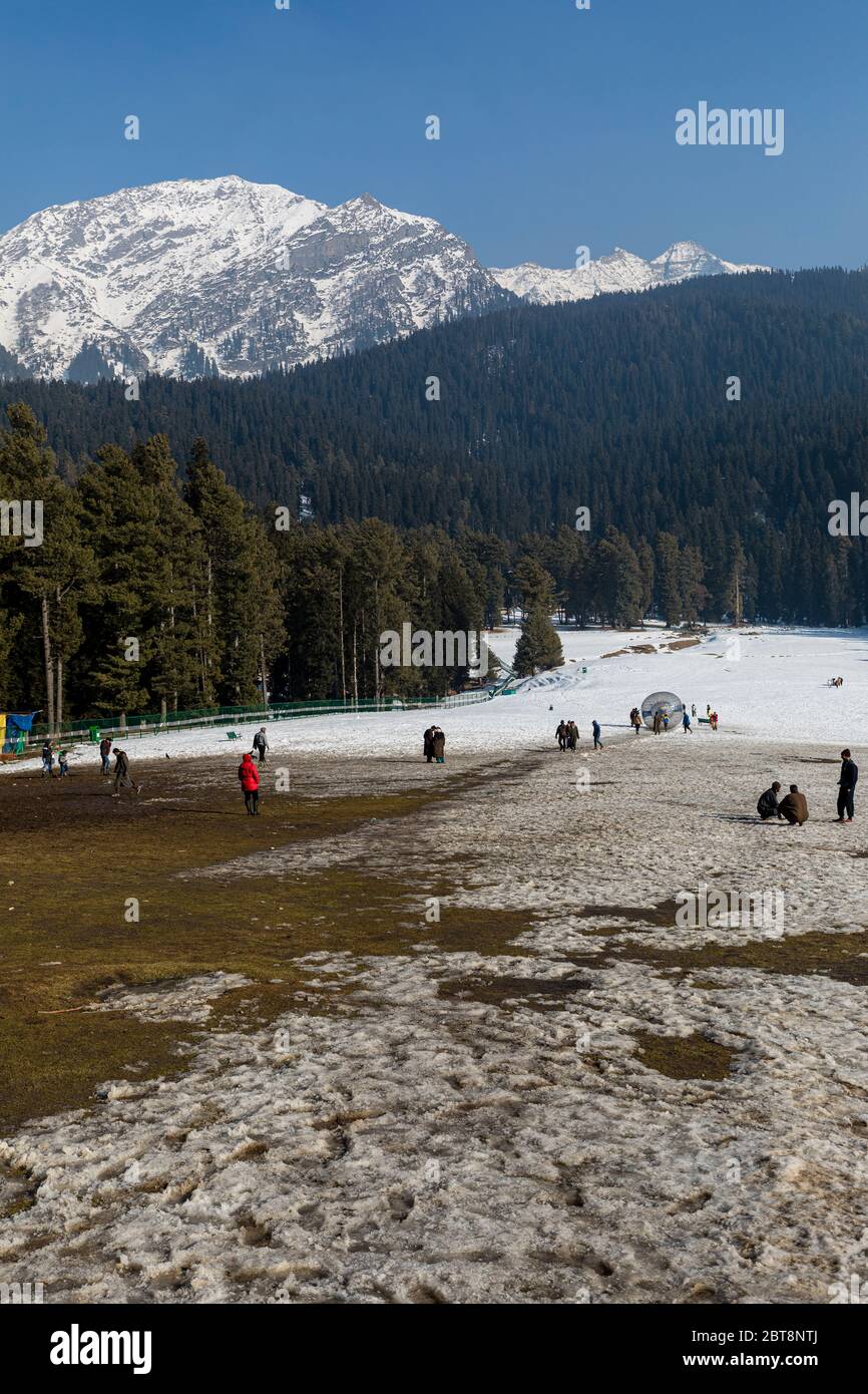 View of tourists enjoying the snow at the popular hill station Pahalgam ...