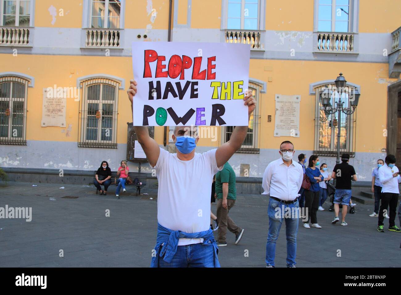 Man in the square with his protest sign to the flash mob organized for ...