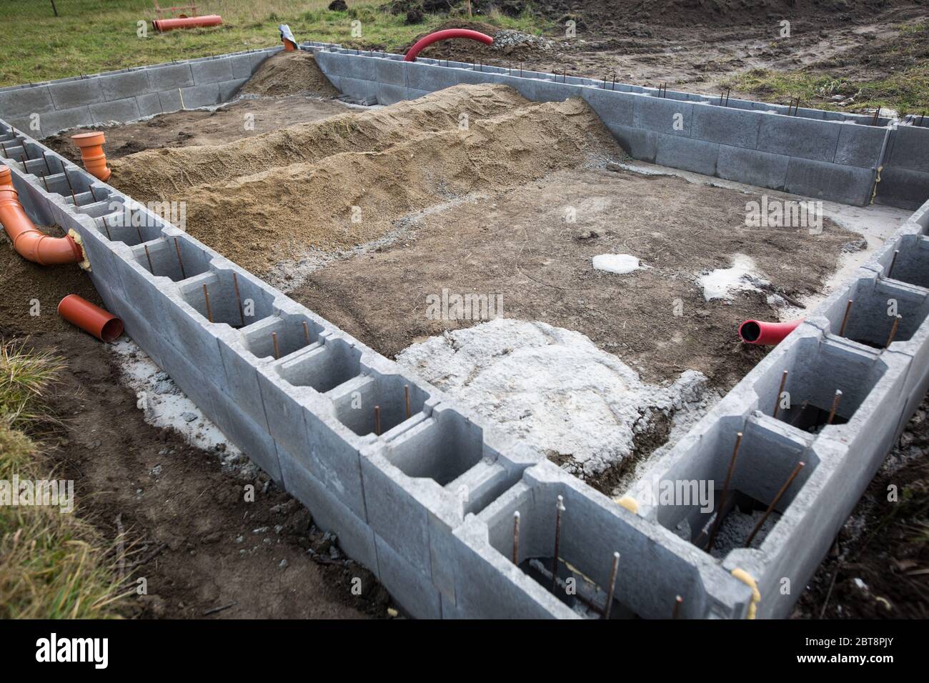 Foundations of the house, unfinished bungalow, rough construction ...