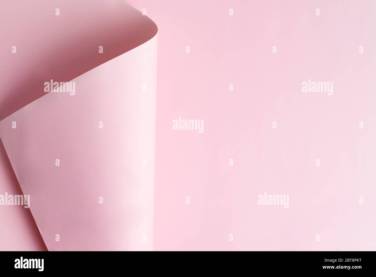 Creative handcraft card as a pink diagonal papercraft background for ...