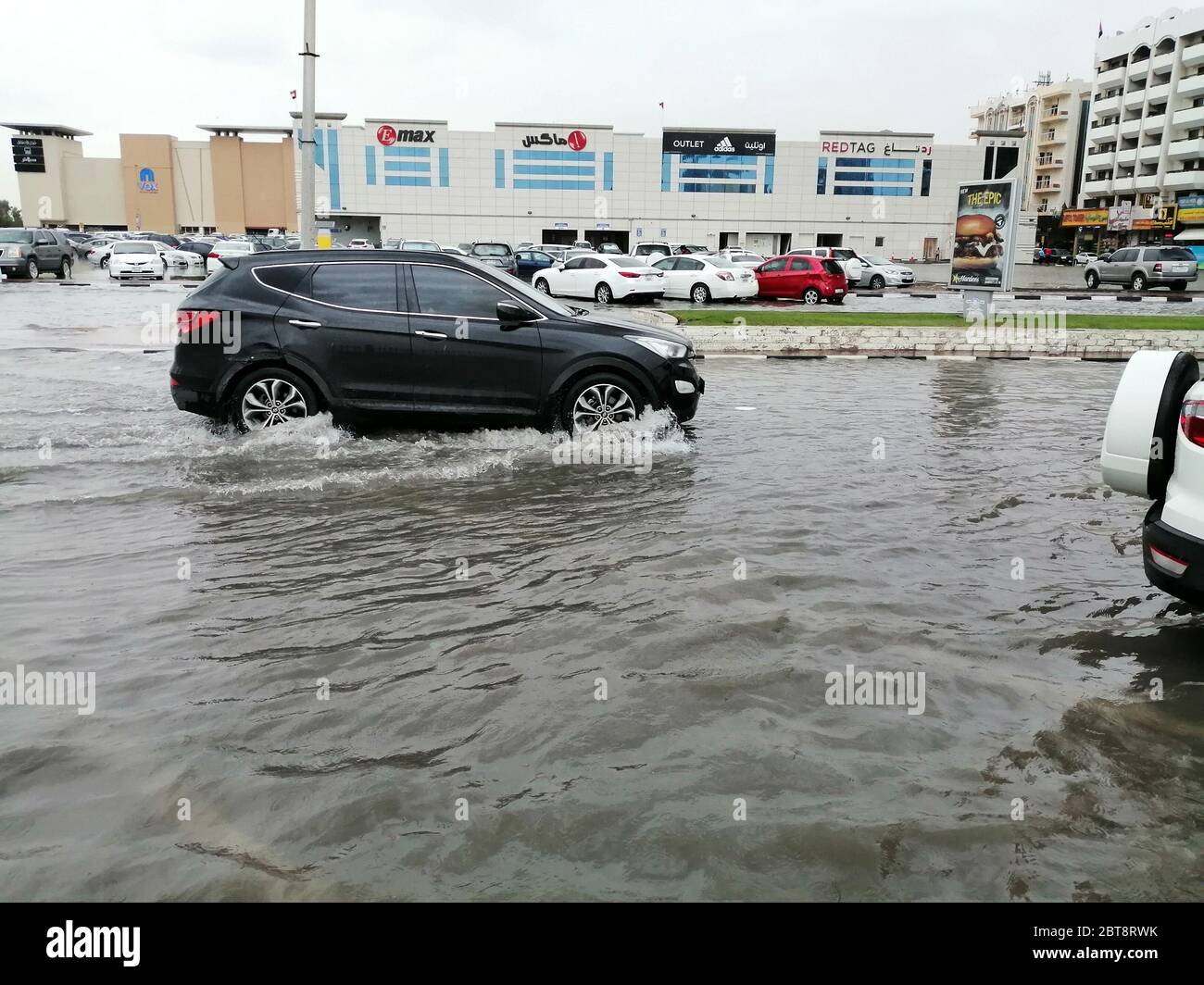 Flooded street in Sharjah city, United Arab Emirates, after the highest ...