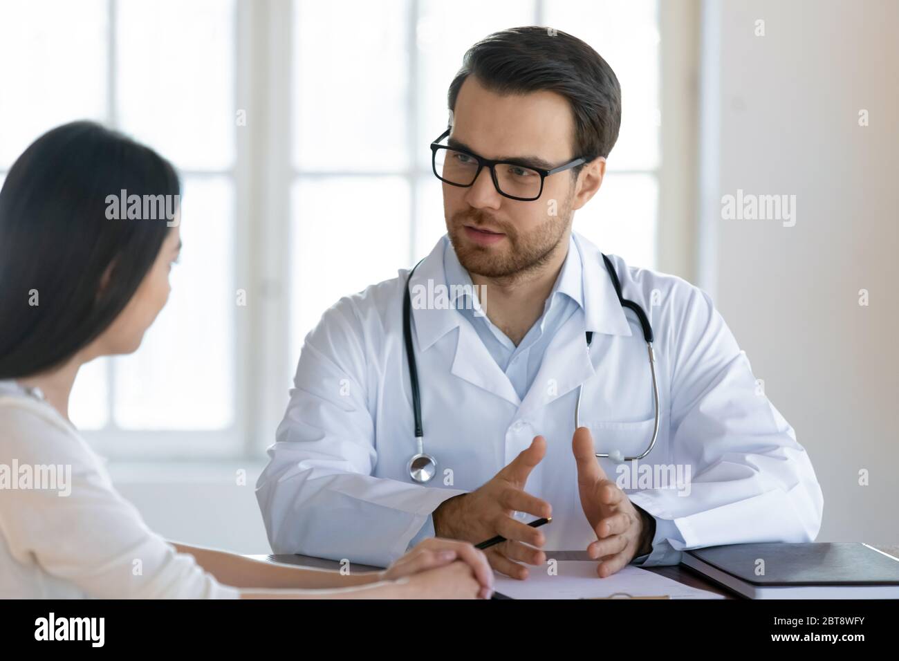 Gp consultation woman hi-res stock photography and images - Alamy