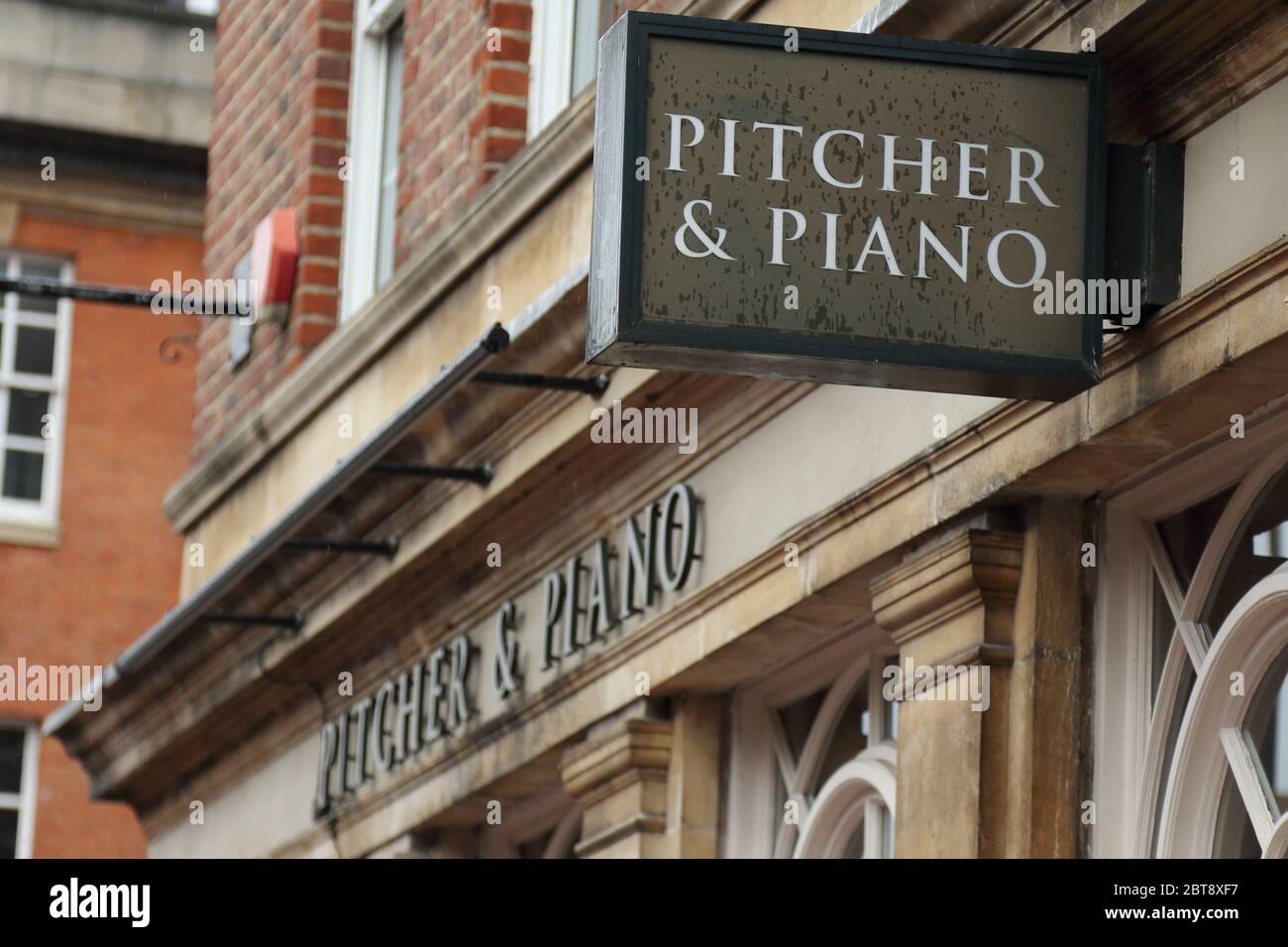 Logo above Pitcher & Piano bar, Reading, UK Stock Photo - Alamy