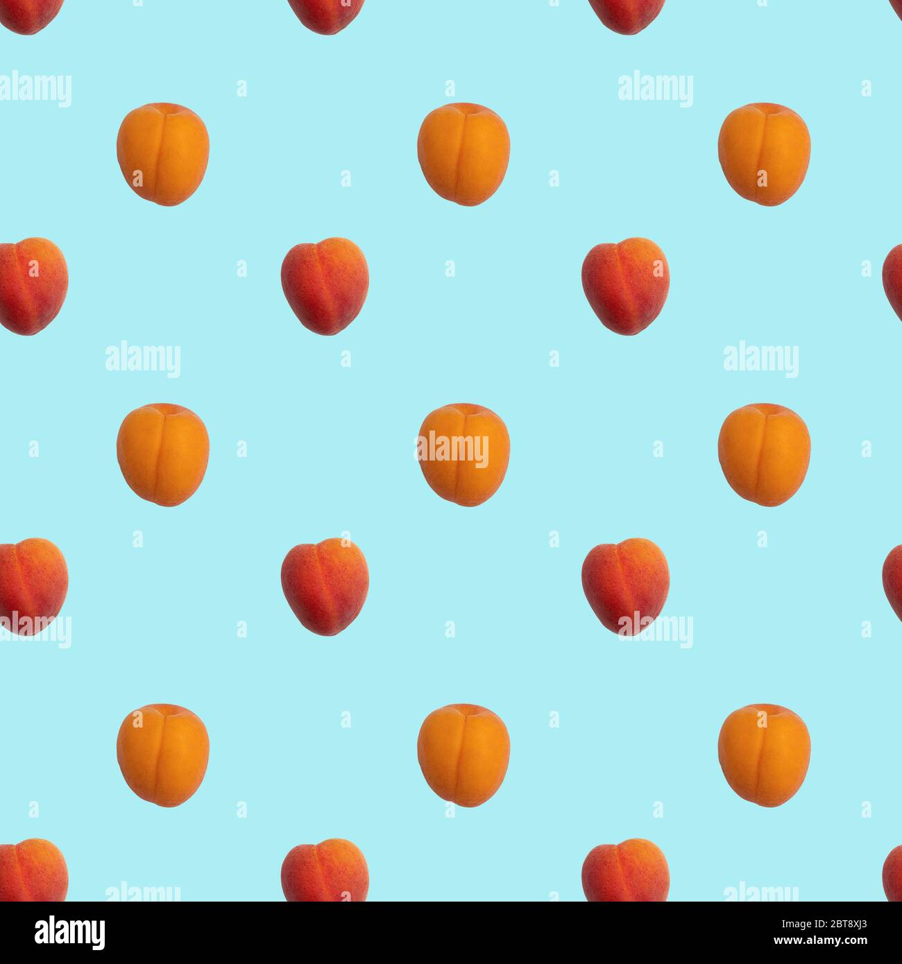 Seamless apricot pattern texture on light blue background Stock Photo ...