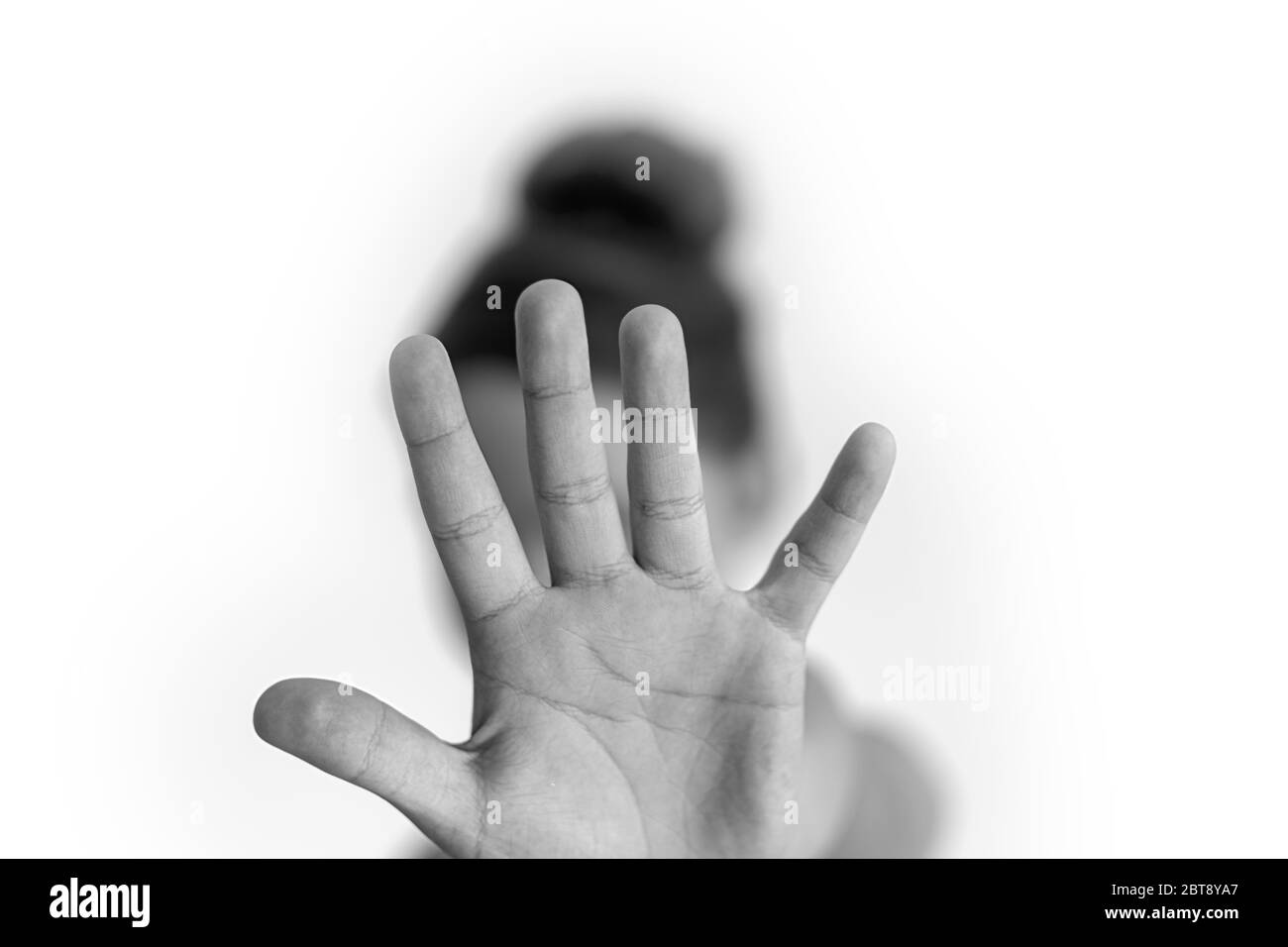 Stop hand. The girl shows stop, covers her face. The woman shows no ...