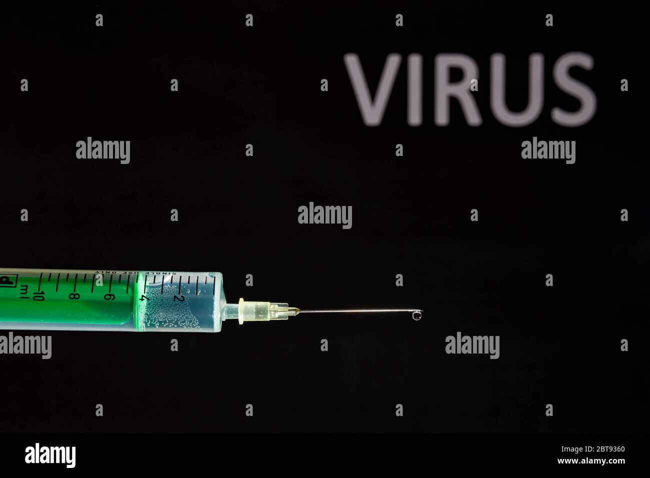 This photo illustration shows a disposable syringe with hypodermic ...
