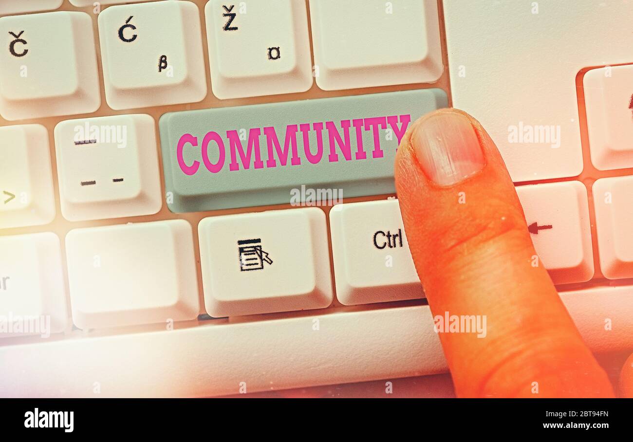 Writing Note Showing Community Business Concept For Specific Population With A Common