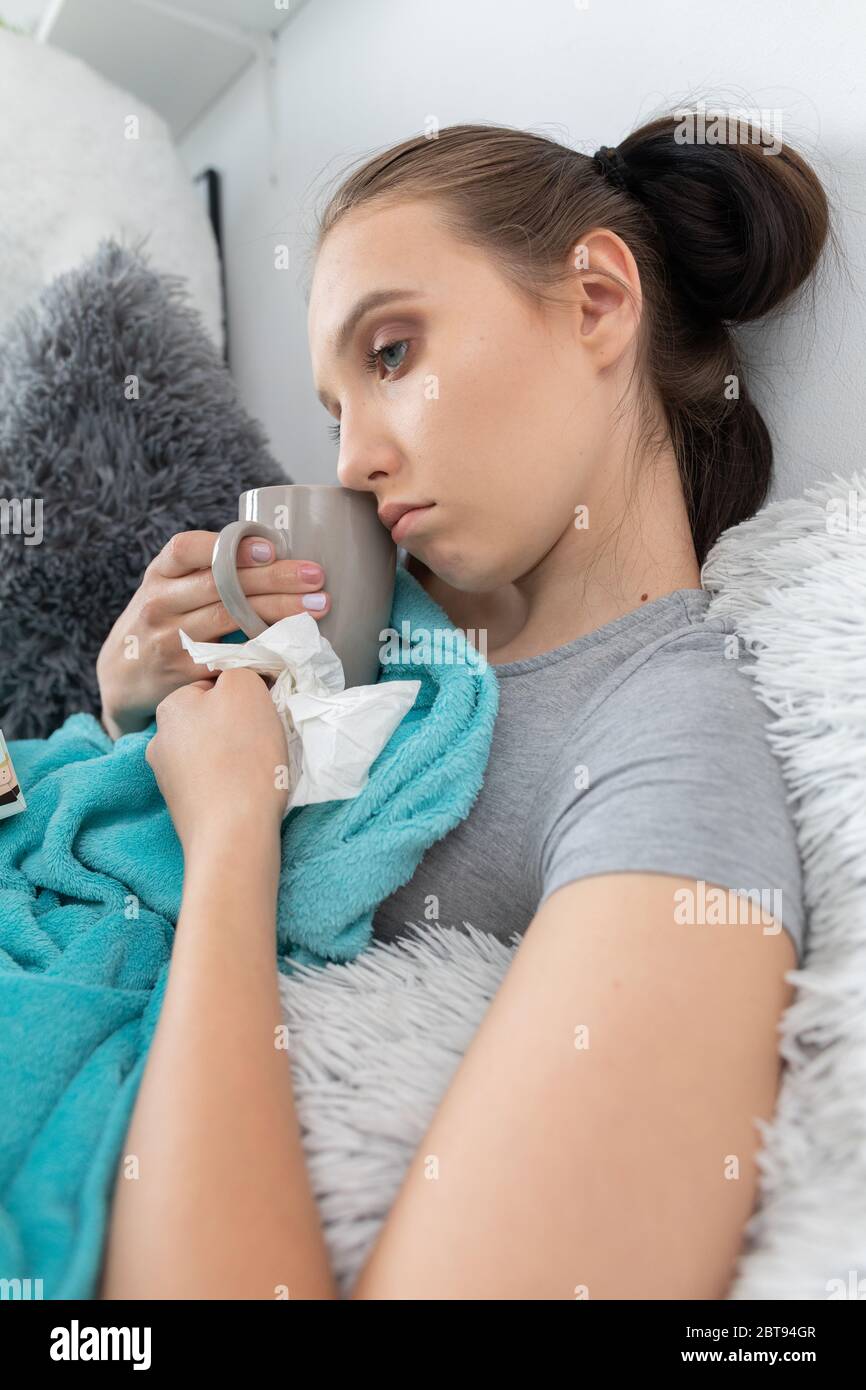 The young girl drinks a special hot infusion of herbs to return to full ...