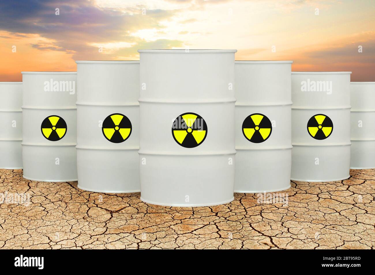 Radioactive waste tanks against sky clouds. Radioactive waste barrels ...
