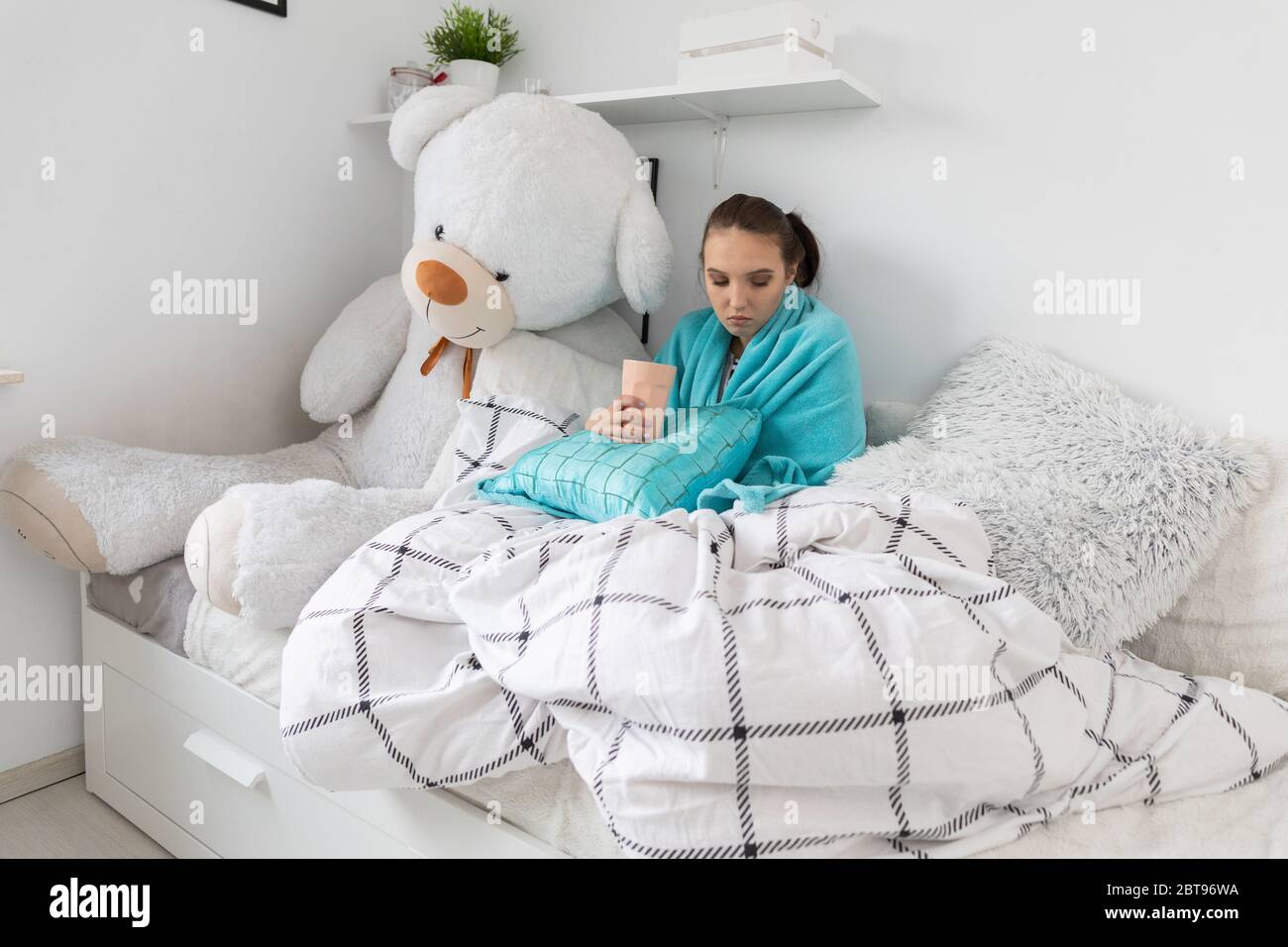 The young girl drinks a special hot infusion of herbs to return to full ...