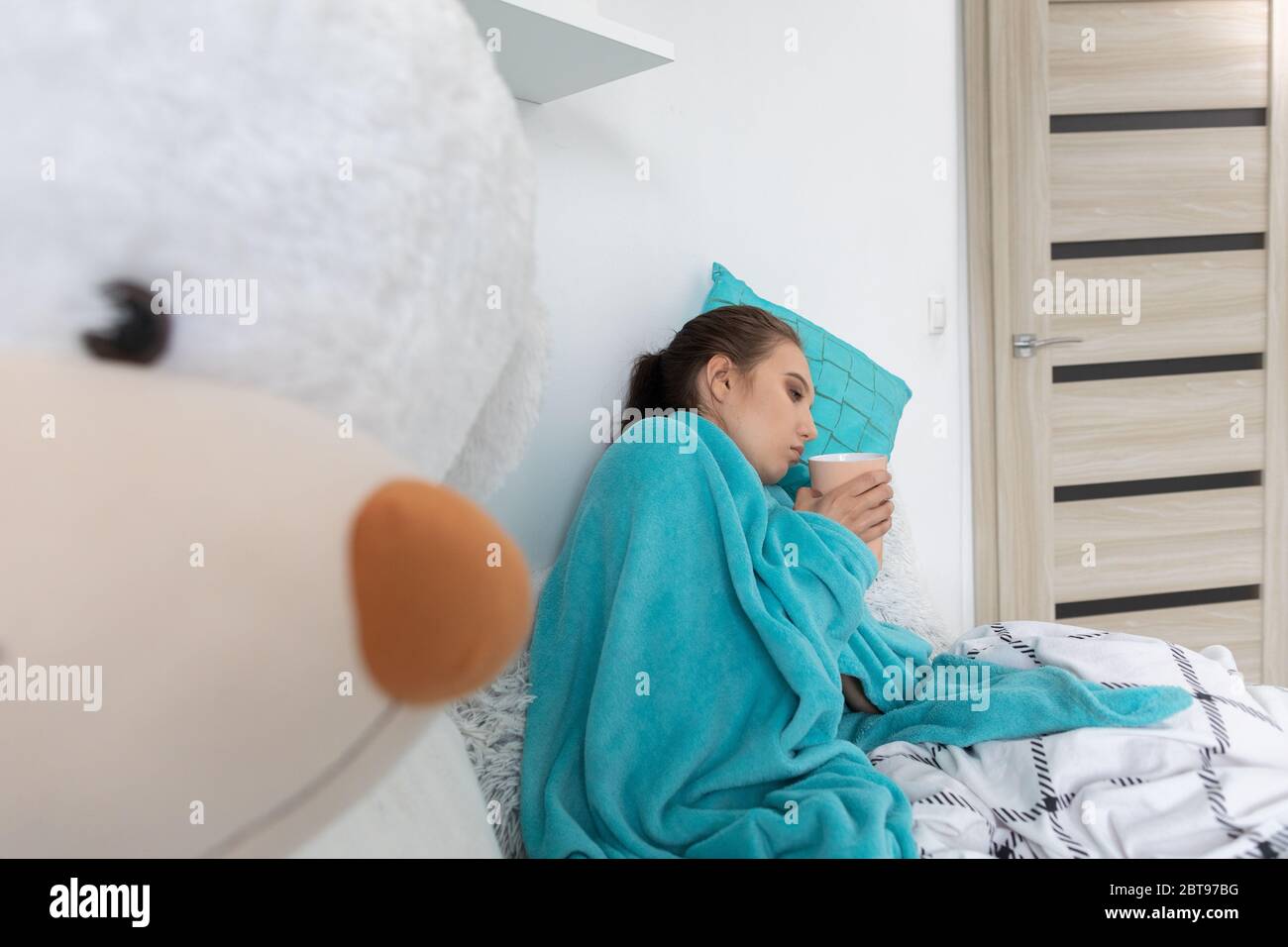 The young girl drinks a special hot infusion of herbs to return to full ...