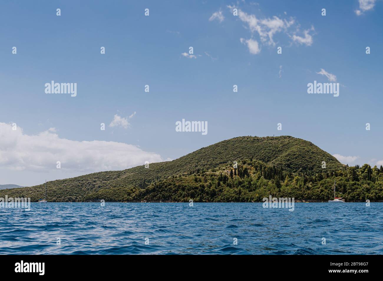 Greek Island viewed from the sea. Beautiful sea landscapes on Island in ...