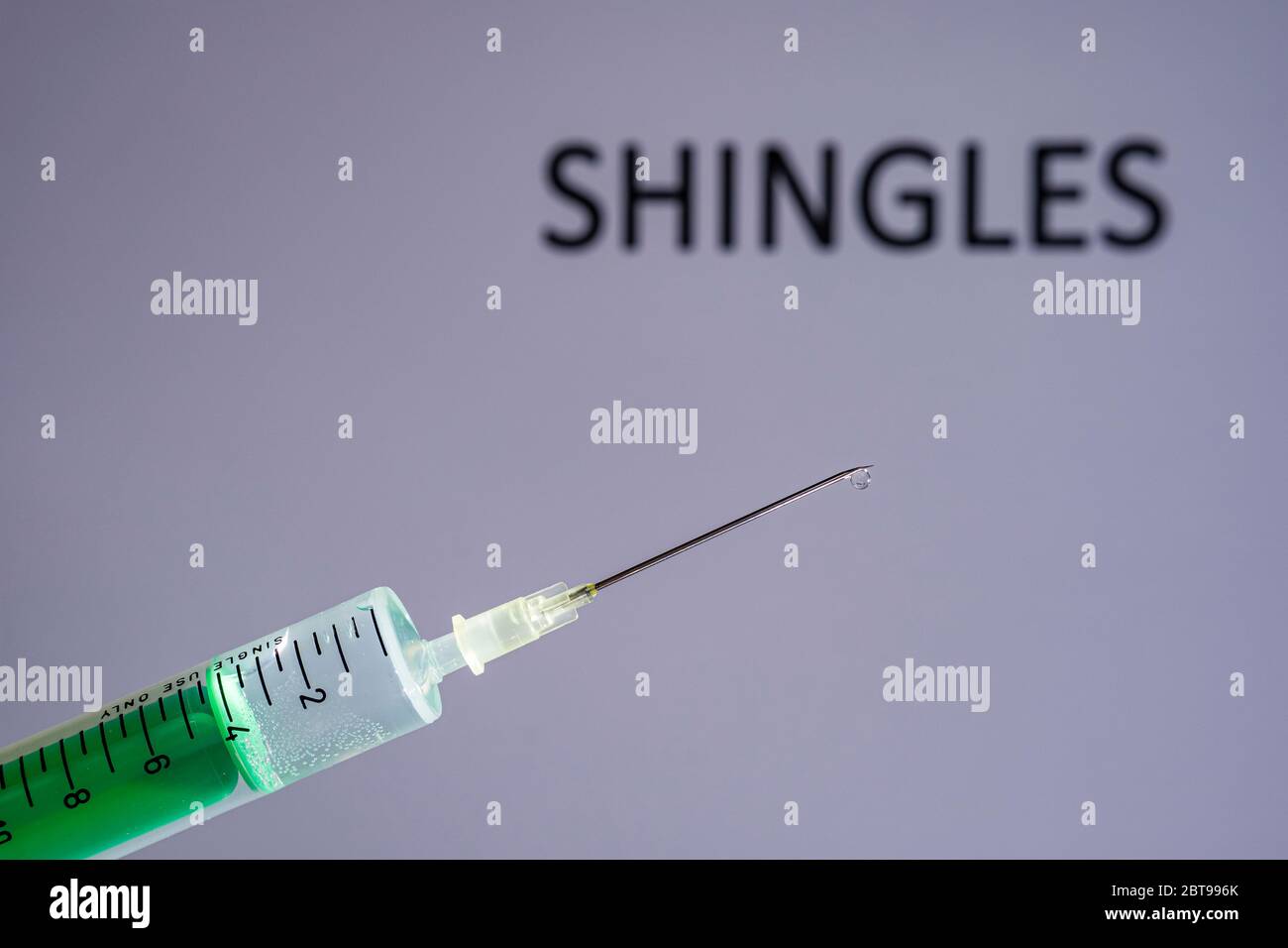 This photo illustration shows a disposable syringe with hypodermic ...