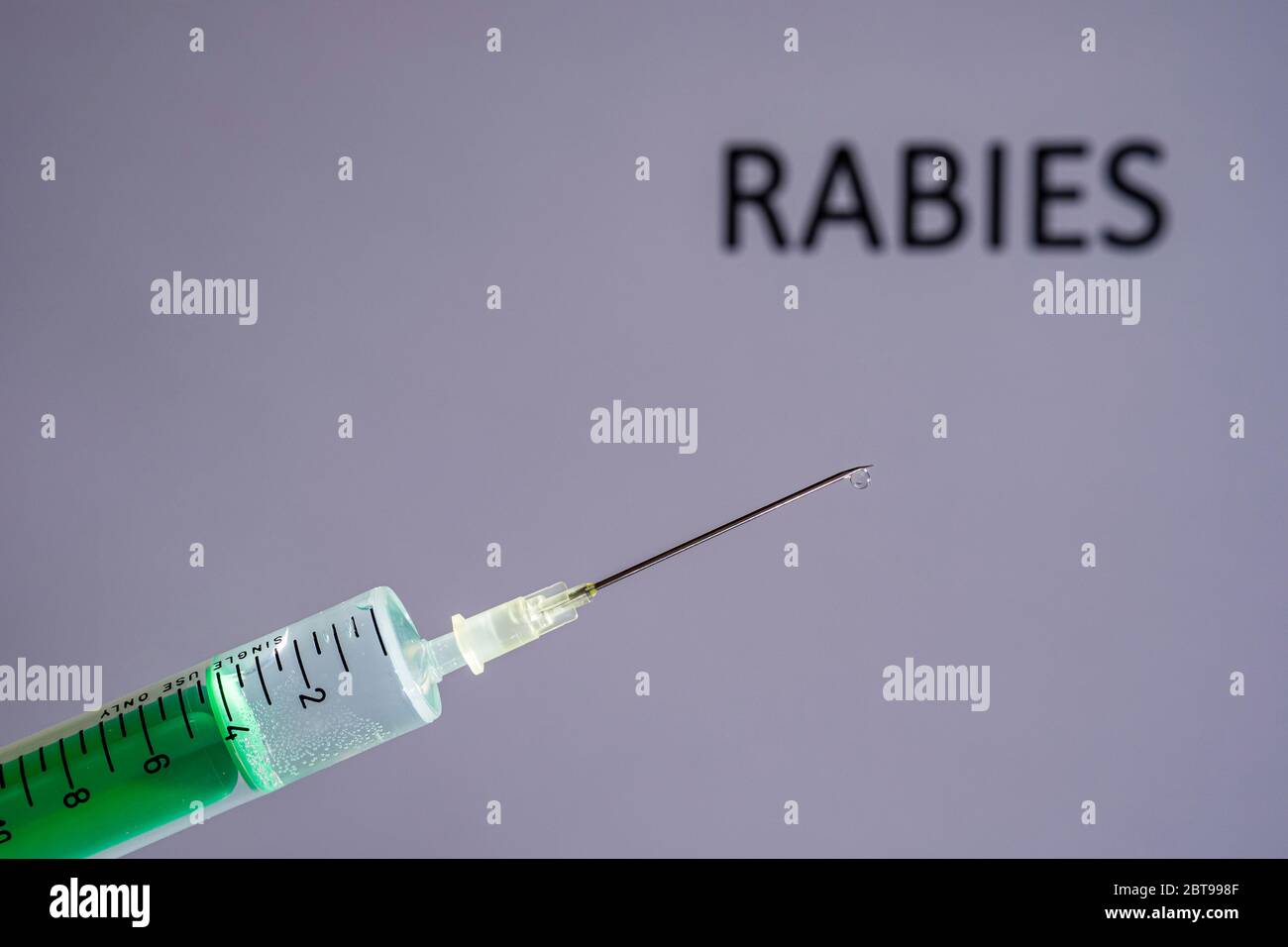 This photo illustration shows a disposable syringe with hypodermic ...