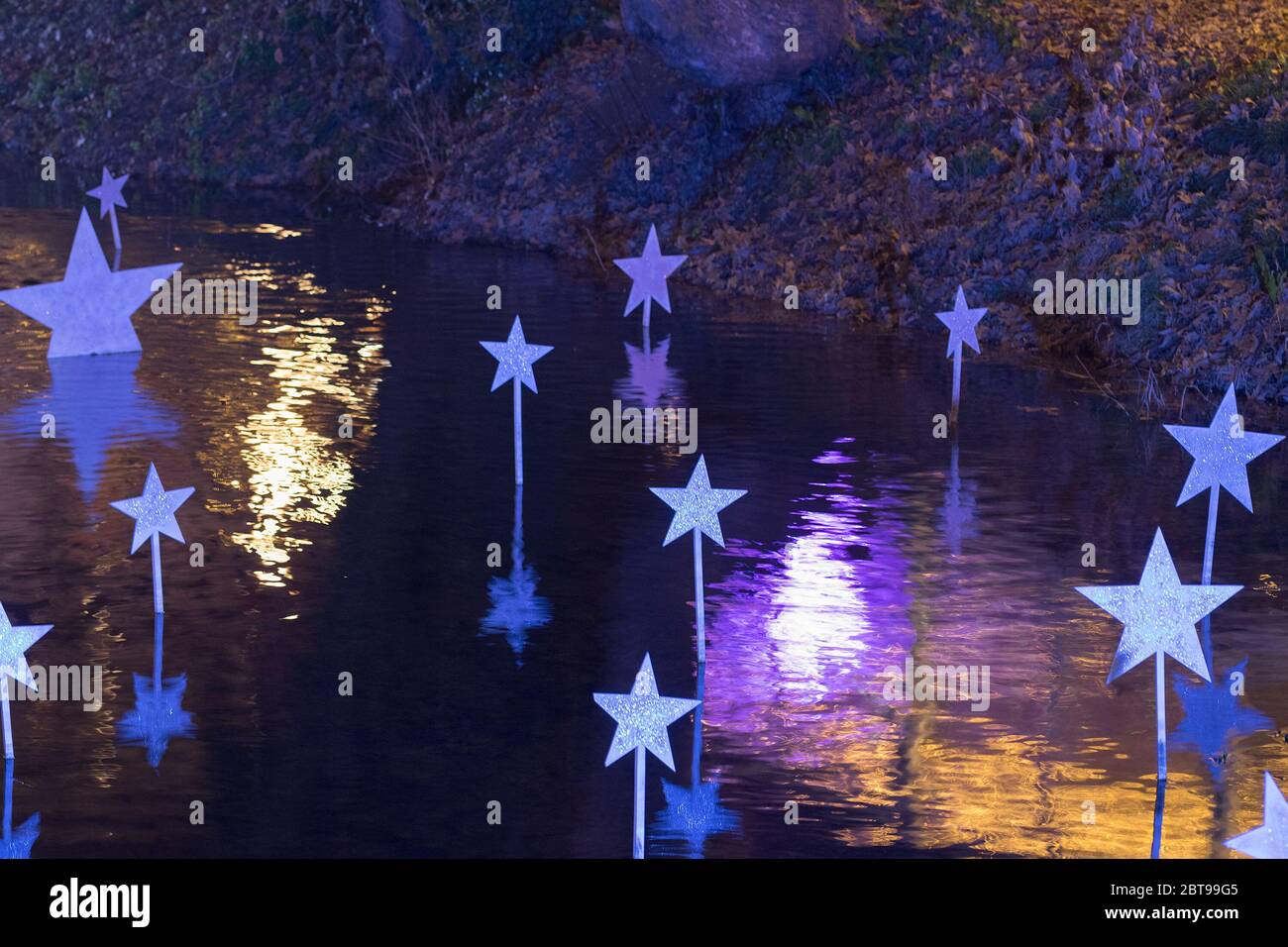 Pond with stars at Christmas Stock Photo - Alamy