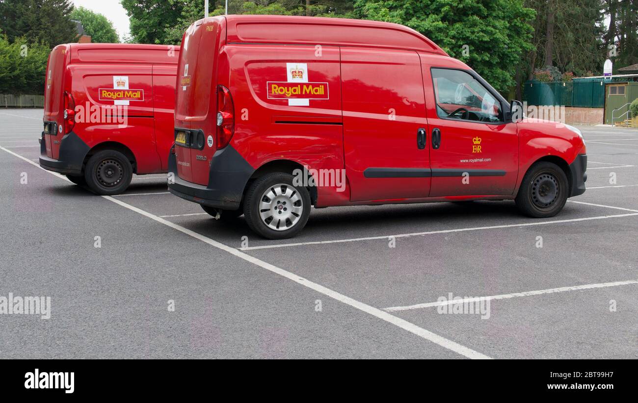 24 May 2020 - England, UK: Red Royal Mail vans side by side in car park ...