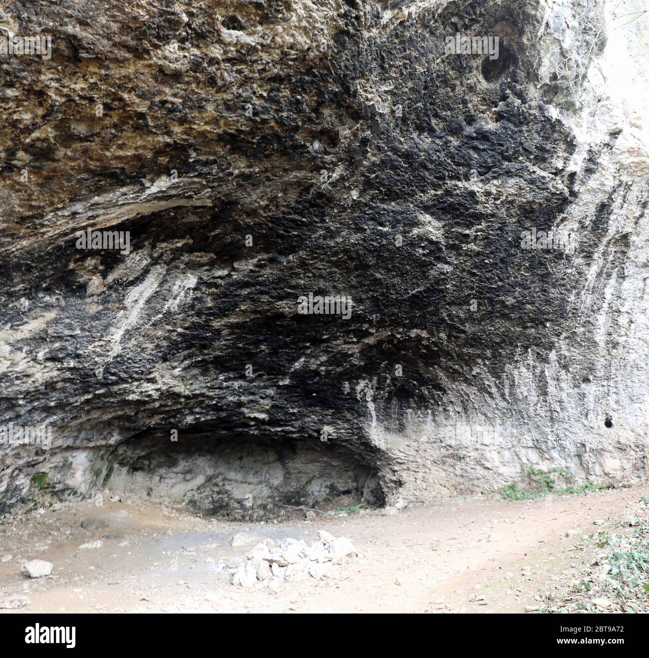 Inside an old cave carved into the rock of the mountain that was once ...
