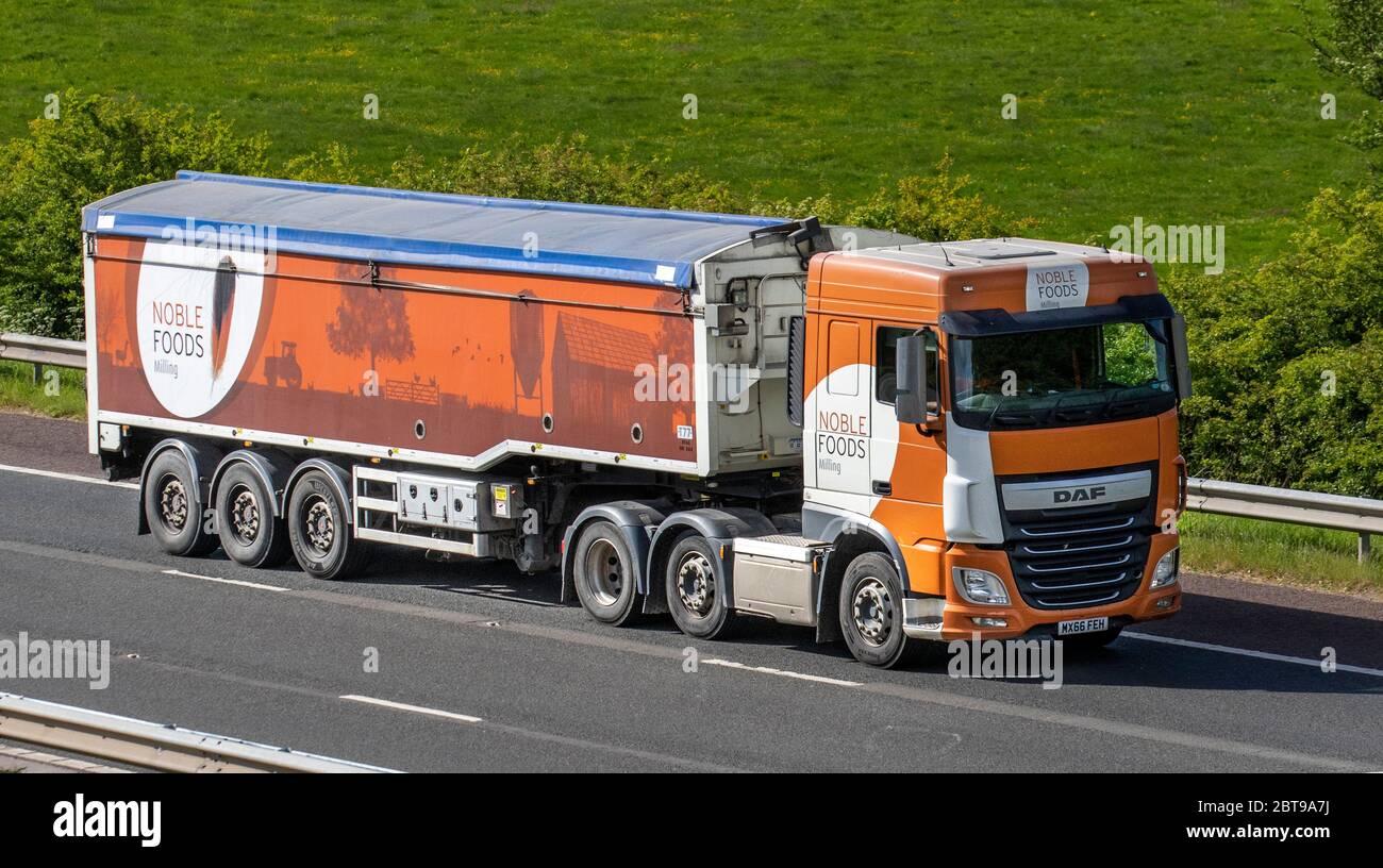 Noble Foods Milling; orange white Haulage delivery trucks, lorry ...