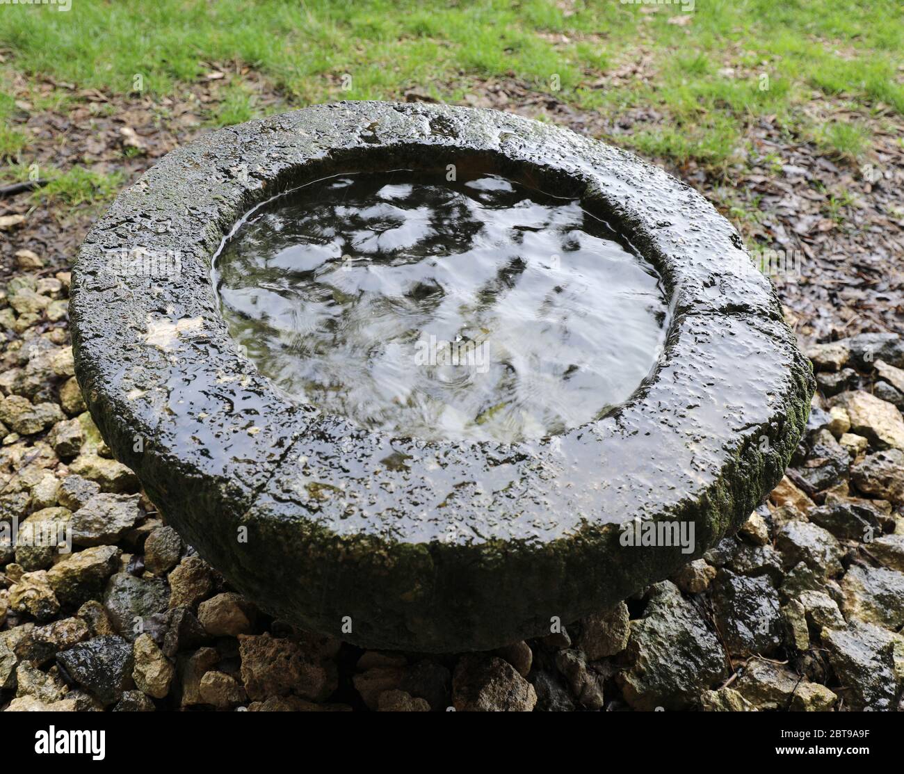 ancient container made of rock full of water to the celebration of ...