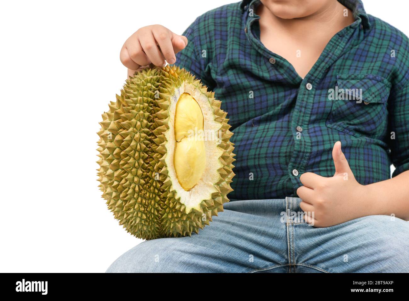 Belly fat boy holding durian isolated on white background, Durian is a ...