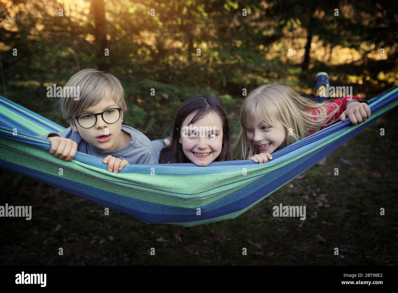 Kids Playing On Hammock High Resolution Stock Photography and Images ...