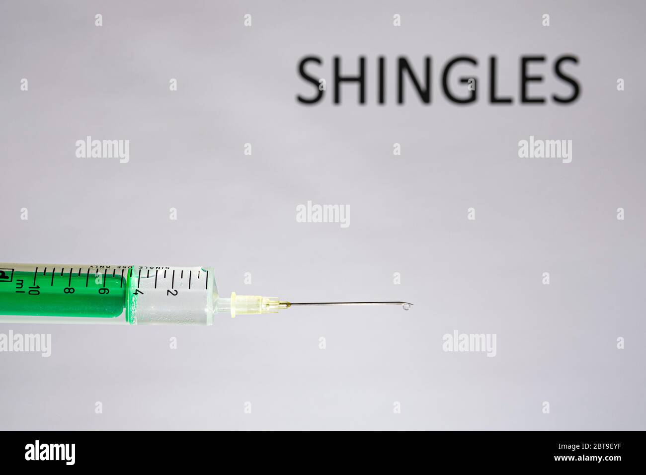 This photo illustration shows a disposable syringe with hypodermic ...
