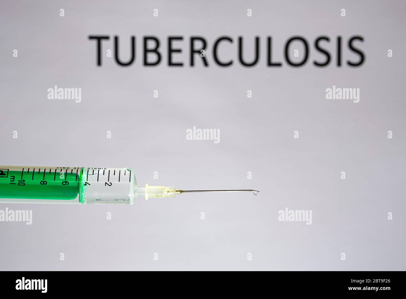 This photo illustration shows a disposable syringe with hypodermic ...