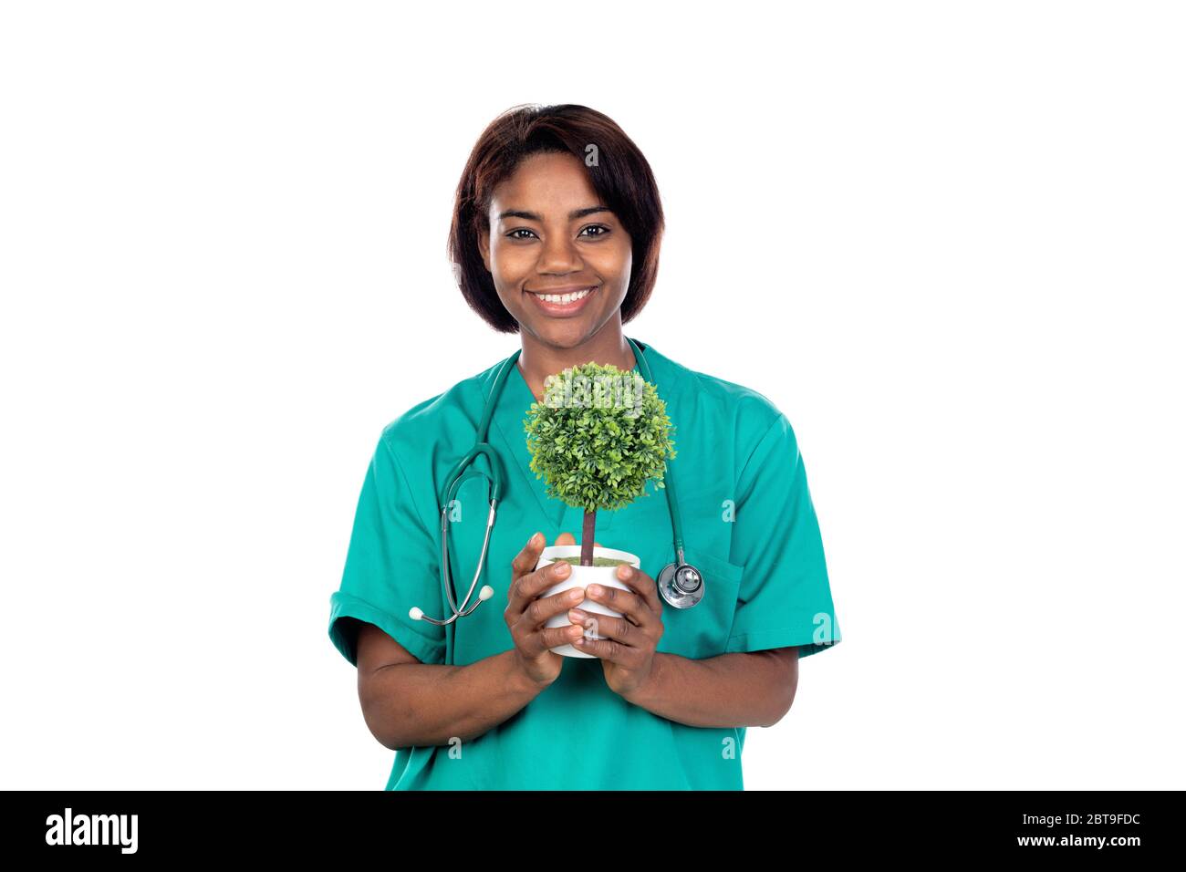 Doctor with green uniform isolated on a white background Stock Photo ...