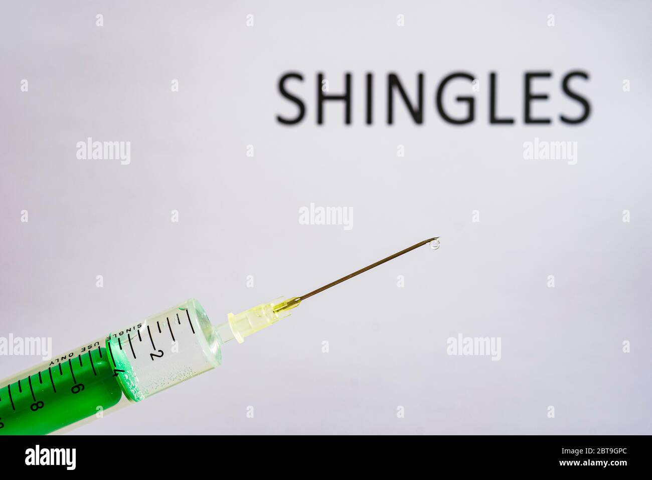 This photo illustration shows a disposable syringe with hypodermic ...