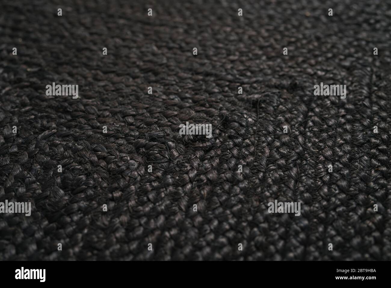 black jute floor rag background closeup Stock Photo - Alamy