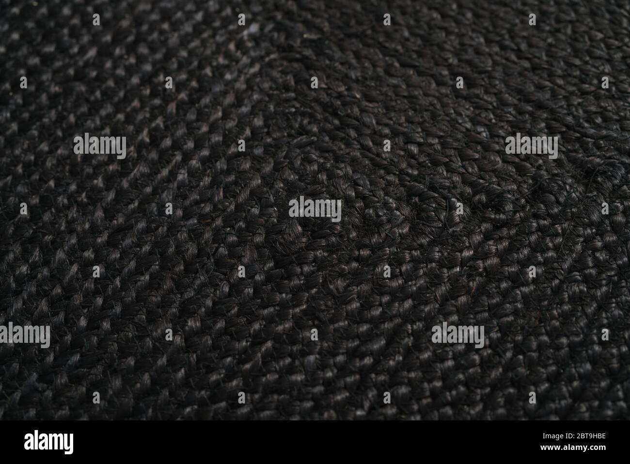 black jute floor rag background closeup Stock Photo - Alamy