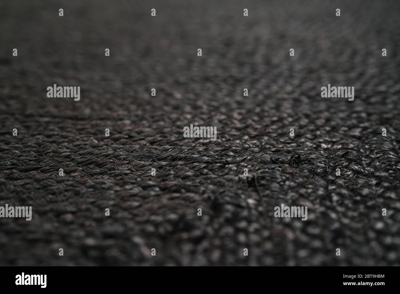 black jute floor rag background closeup Stock Photo - Alamy