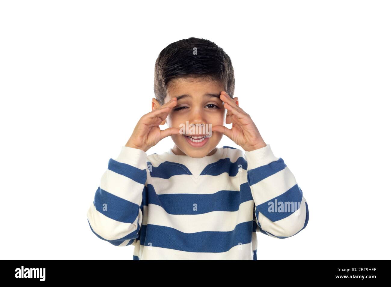 Worried latin child isolated on a white background Stock Photo - Alamy