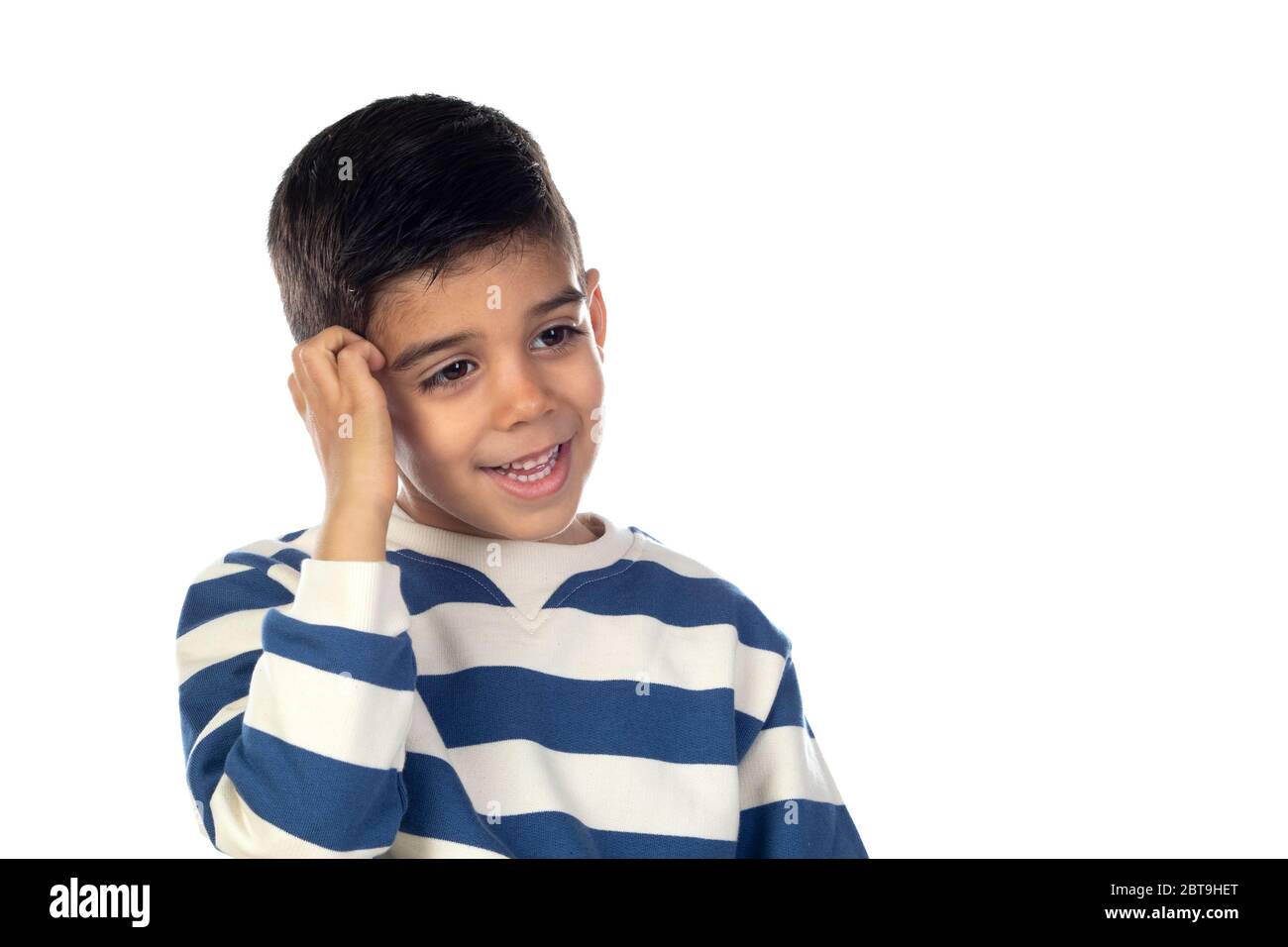 Worried latin child isolated on a white background Stock Photo - Alamy