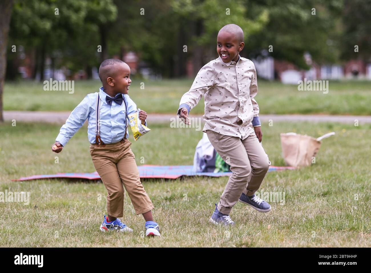 Young British black children playing in the park, UK Stock Photo - Alamy