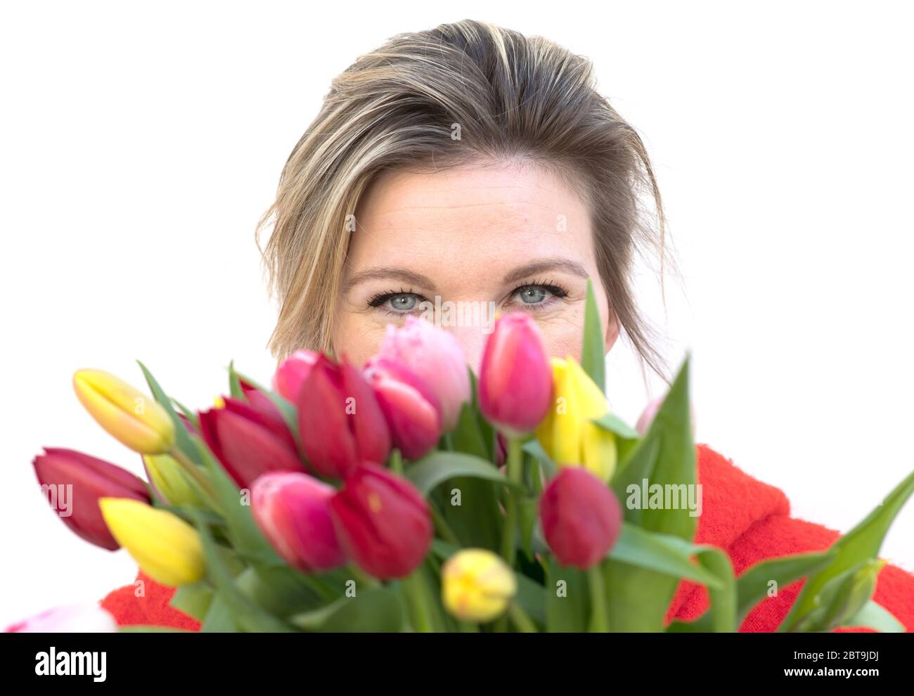 dutch flowers tulips beautiful woman behind flowers Stock Photo - Alamy