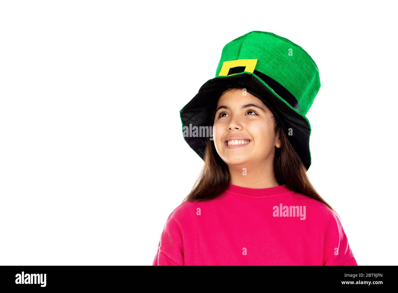 Adorable girl with a big green hat isolated on a white background Stock ...
