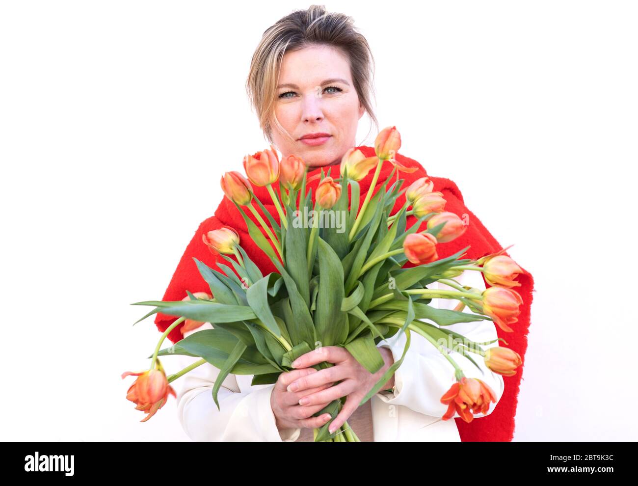 dutch flowers tulips beautiful woman behind flowers Stock Photo - Alamy