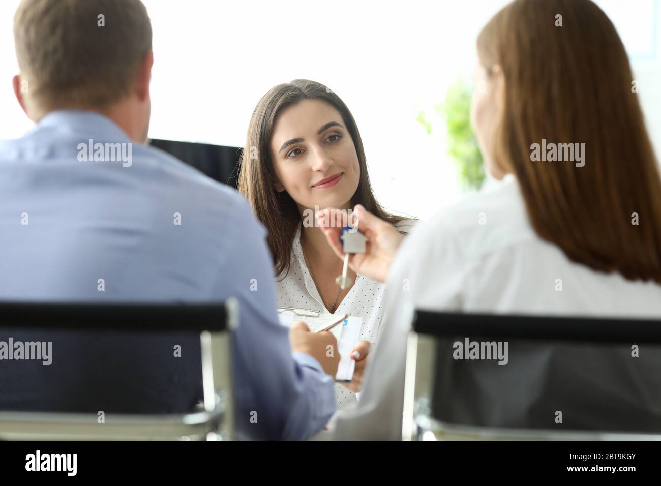 Joyful business agent Stock Photo - Alamy