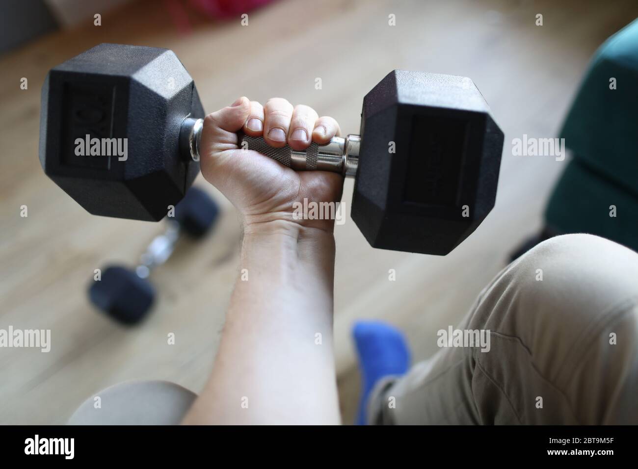 Person workout with tool Stock Photo - Alamy