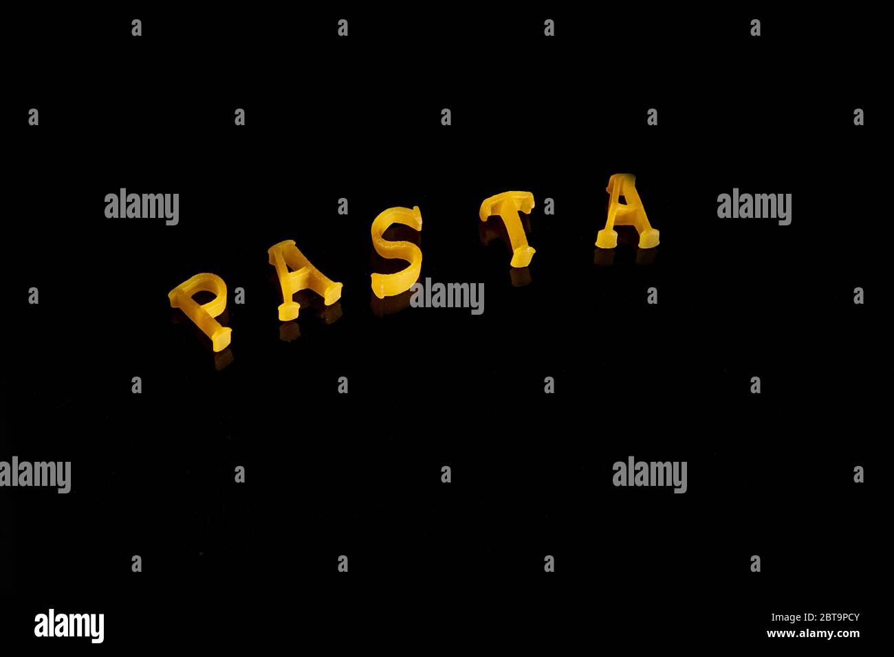 Pasta word made of different types of pasta on black background Stock ...