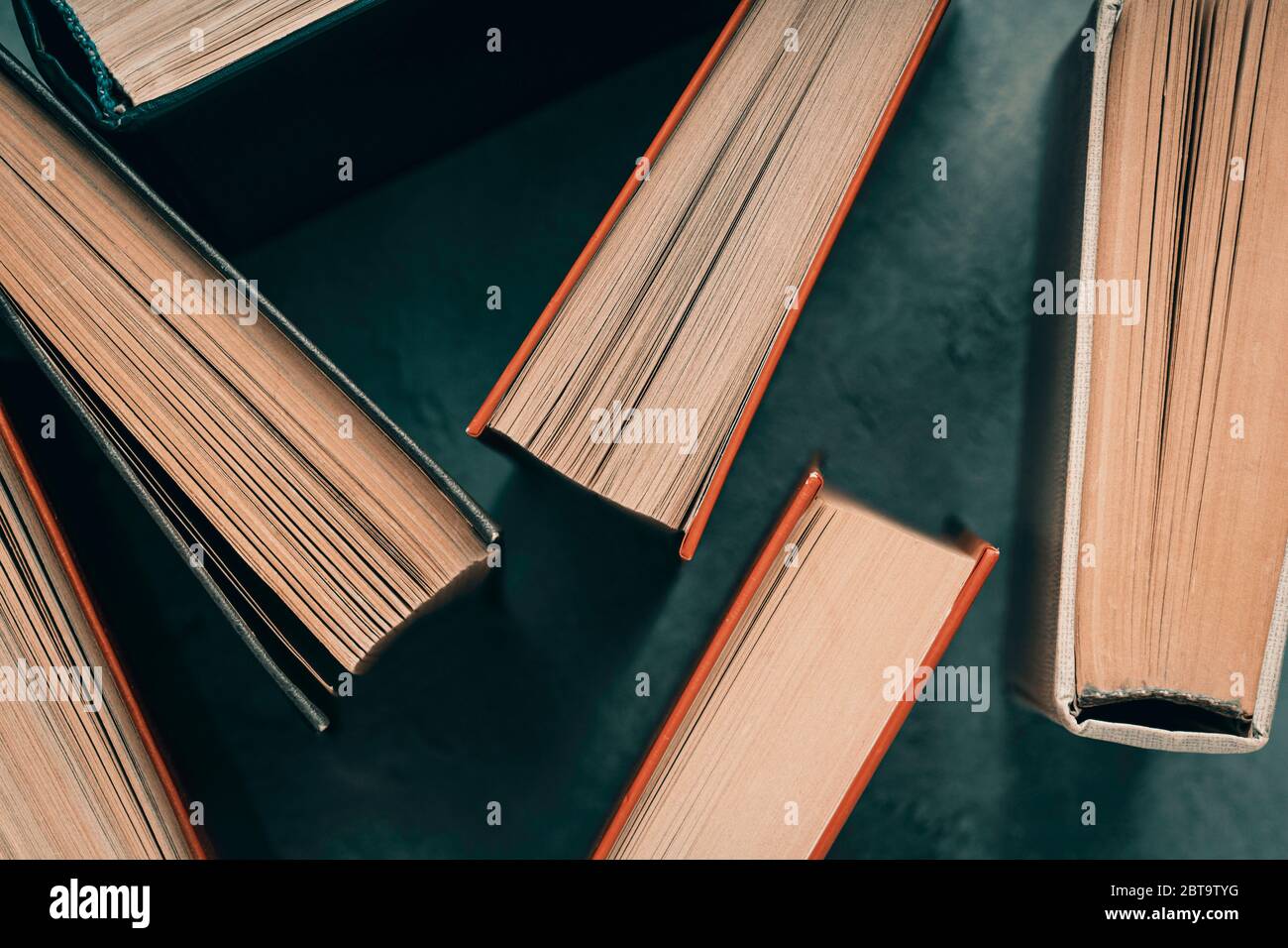 Books top view. Back to school concept . toned Stock Photo - Alamy