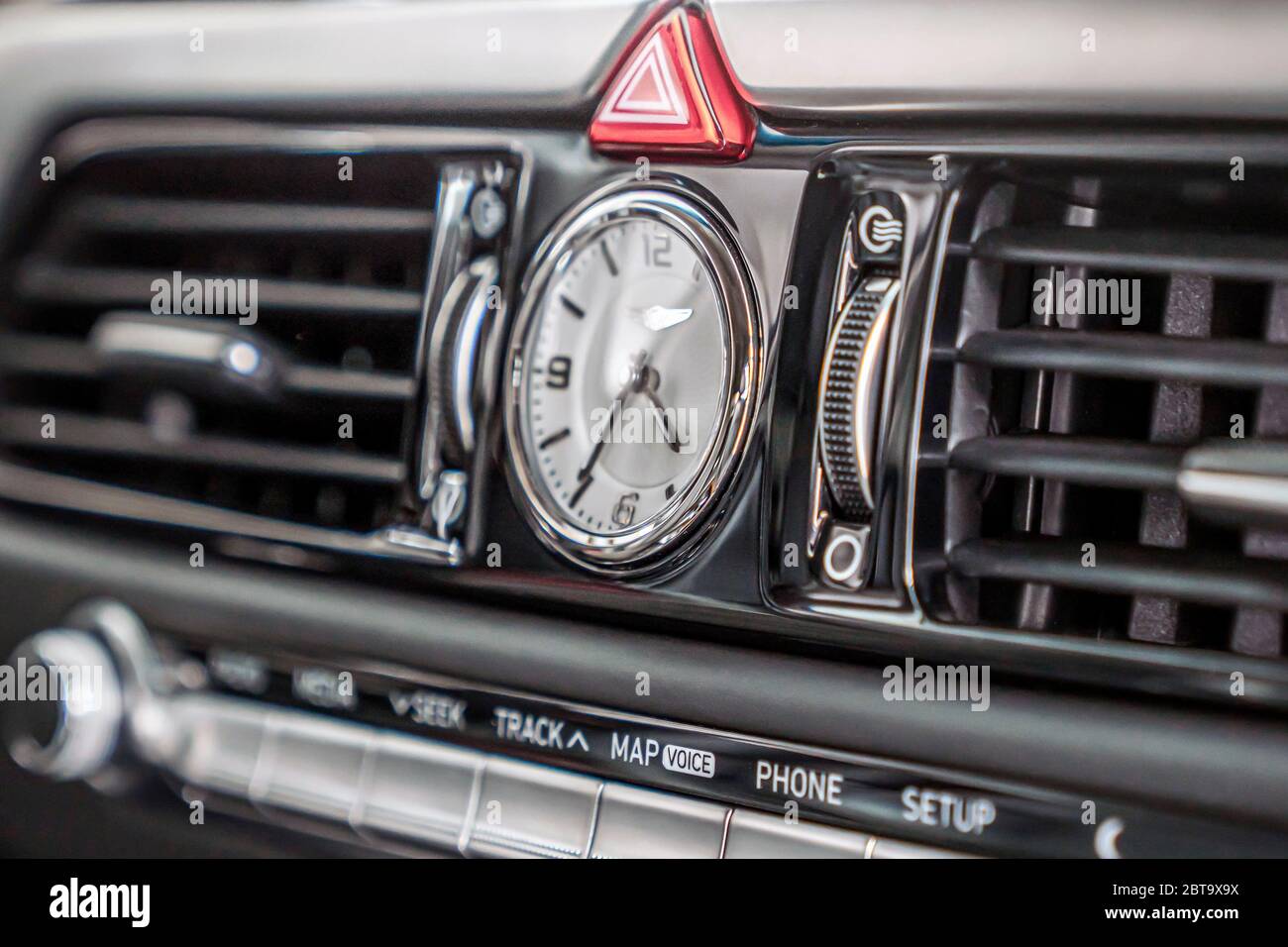 analog clock in the car interior close-up Stock Photo - Alamy